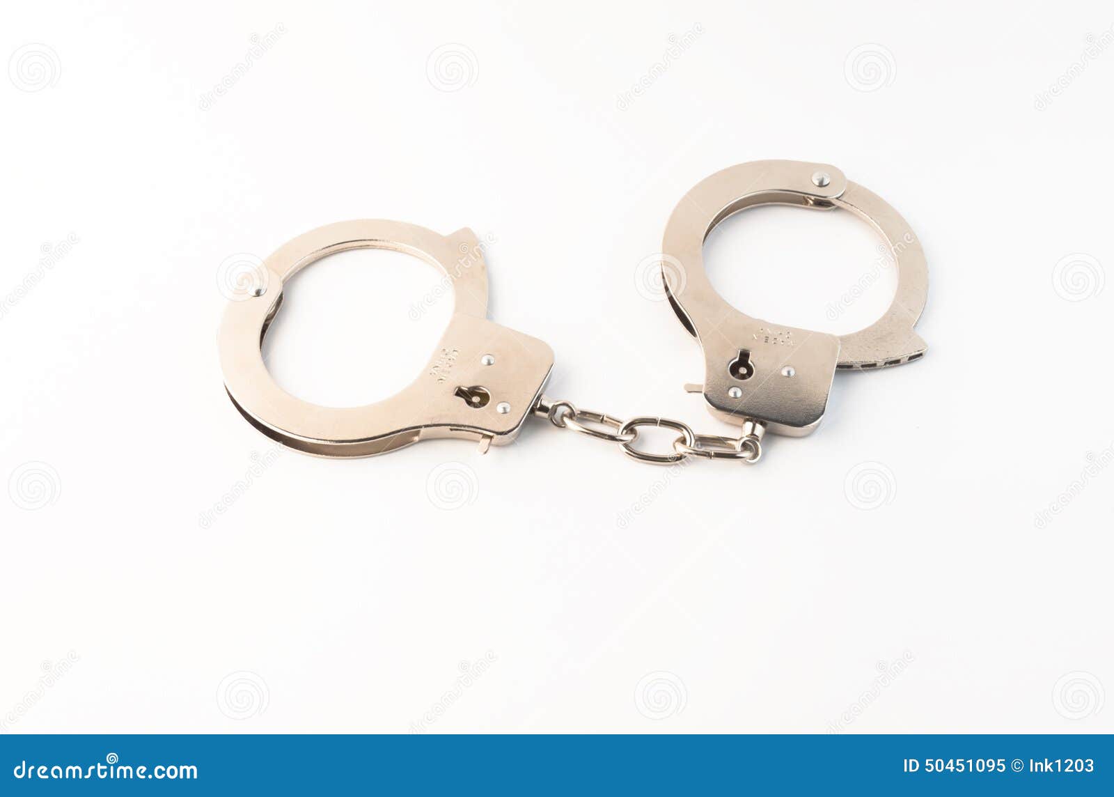 Steel Handcuffs on a Green Background Stock Image - Image of ...