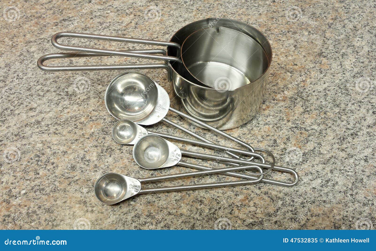 Set Of Measuring Cups Lined On White Background Top View Stock ...