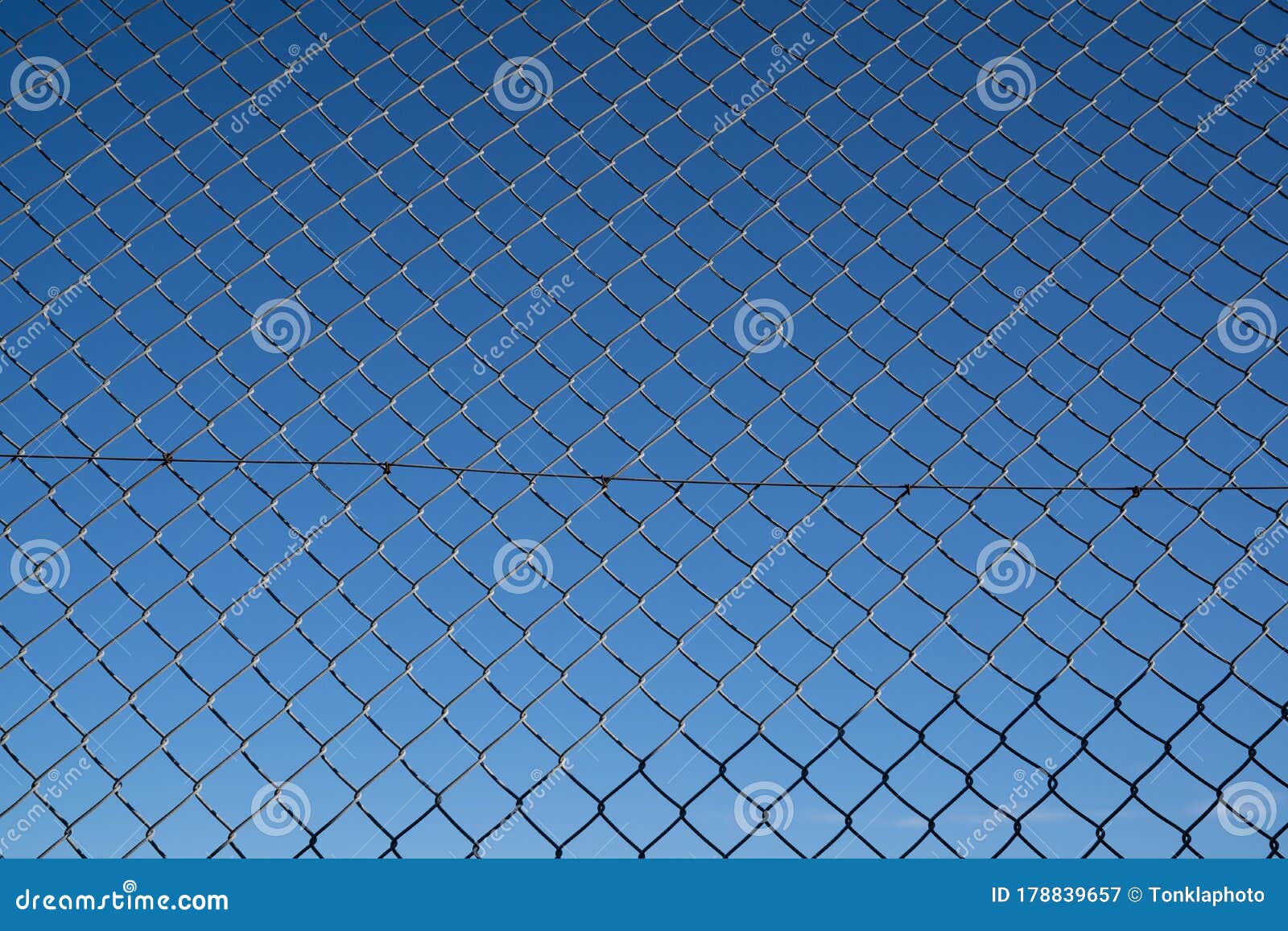 Steel Mesh Wire Fence with Blue Sky Under Blue Sky Stock Image - Image ...