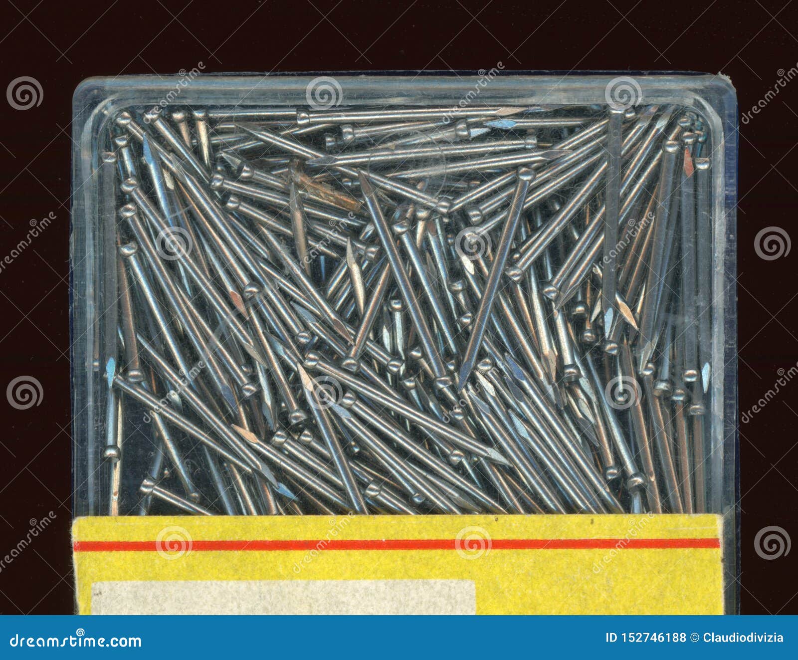 Steel nails in plastic box stock photo. Image of nails - 152746188