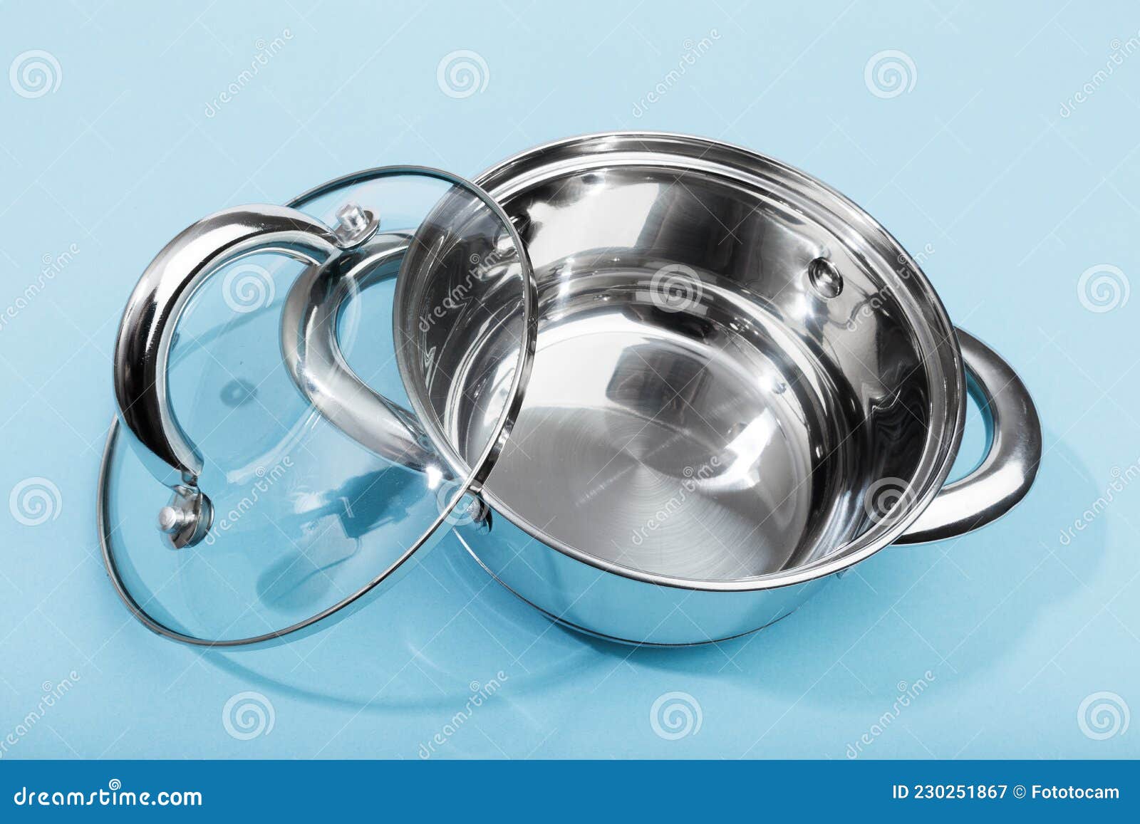 Steel Pan with a Transparent Lid on Blue Background Stock Image - Image ...