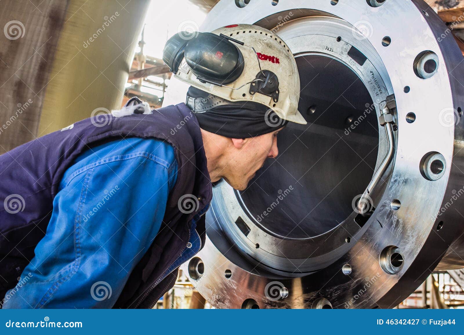 Steel pipe inspector editorial photography. Image of inspect - 46342427