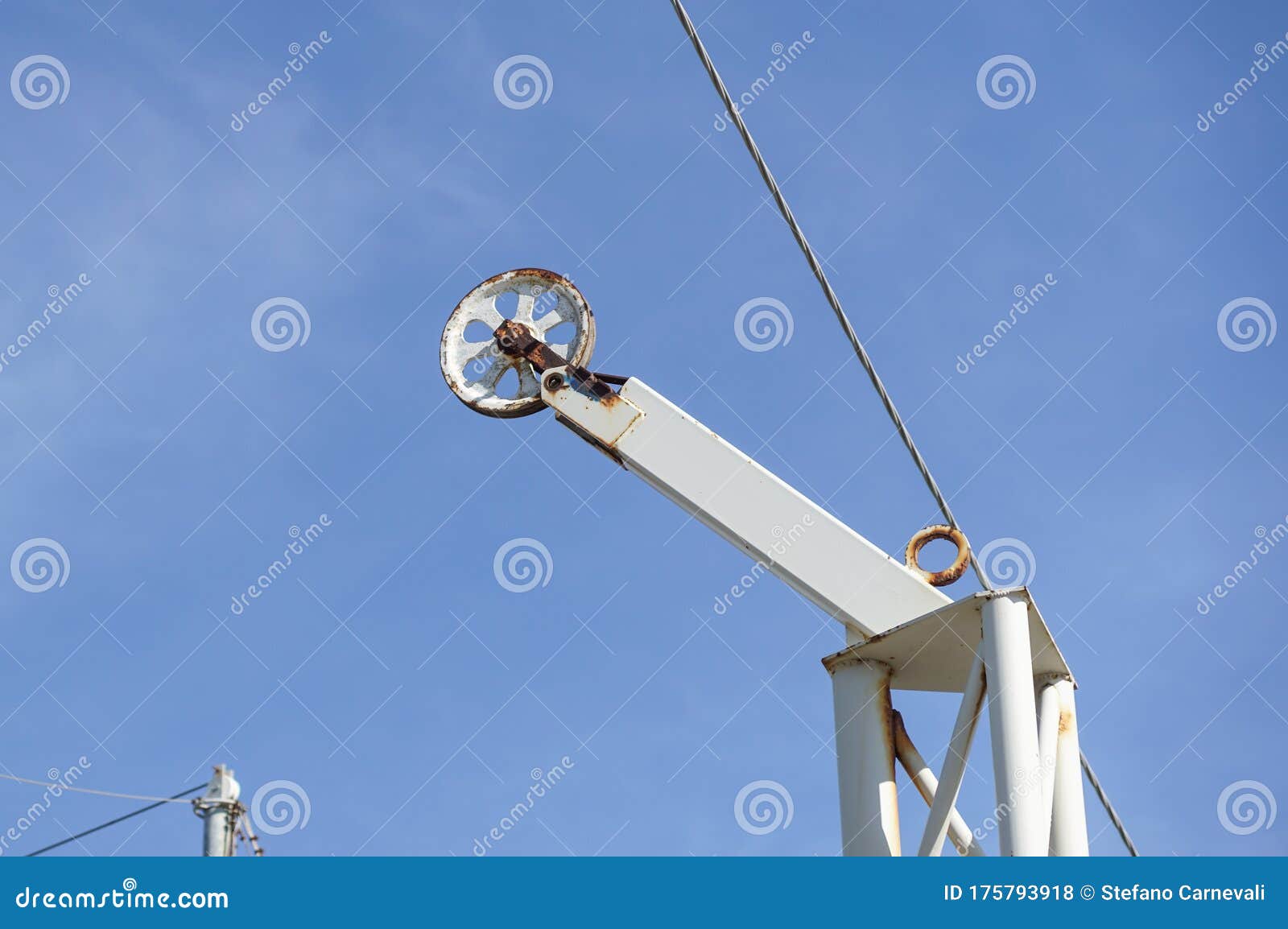 Steel Pulley Wheel with Three Steel Cables Looping Around the Pulley ...