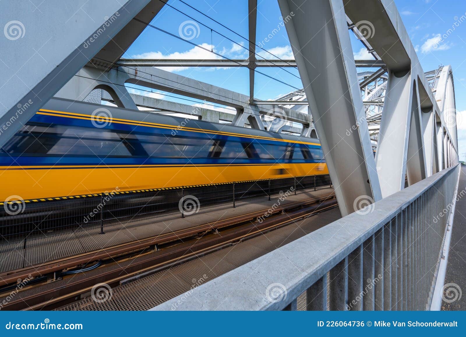 Steel Railroad Bridge with a Passing Train Stock Photo - Image of ...