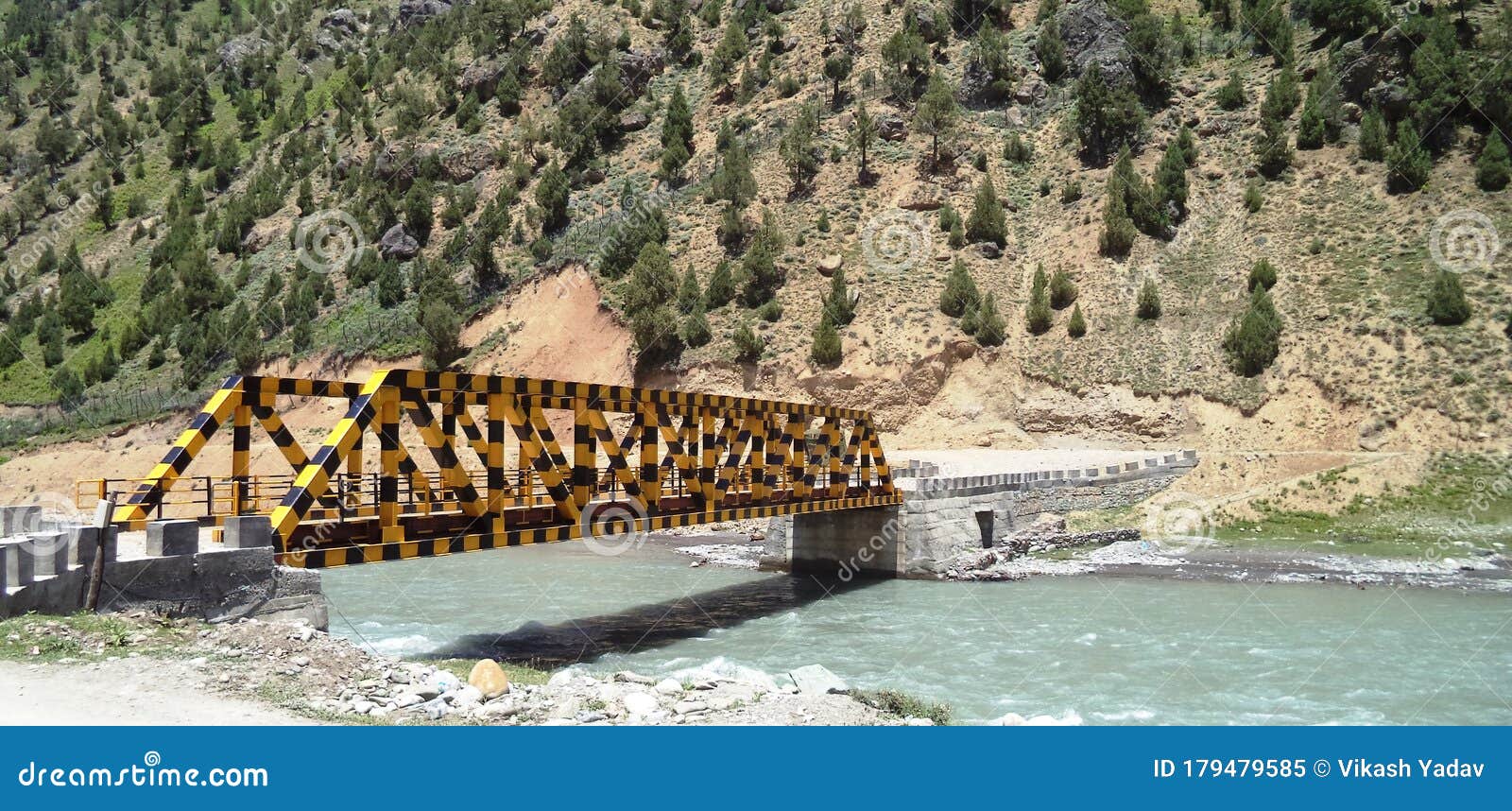 Steel Road Bridge Over a River of Blue Flow of Water Stock Image ...