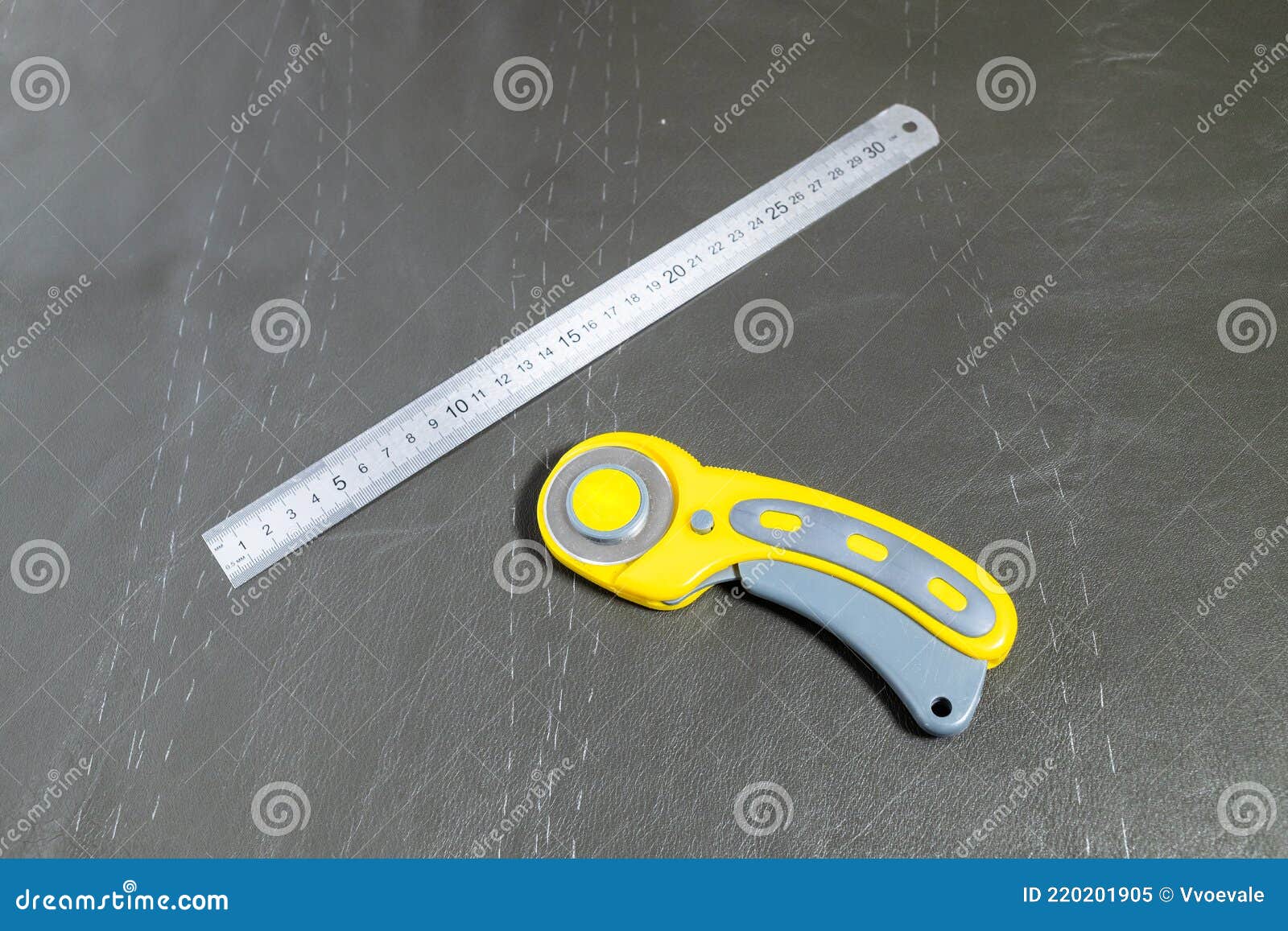 Steel Ruler and Rotary Cutter on Leather Surface Stock Image - Image of ...