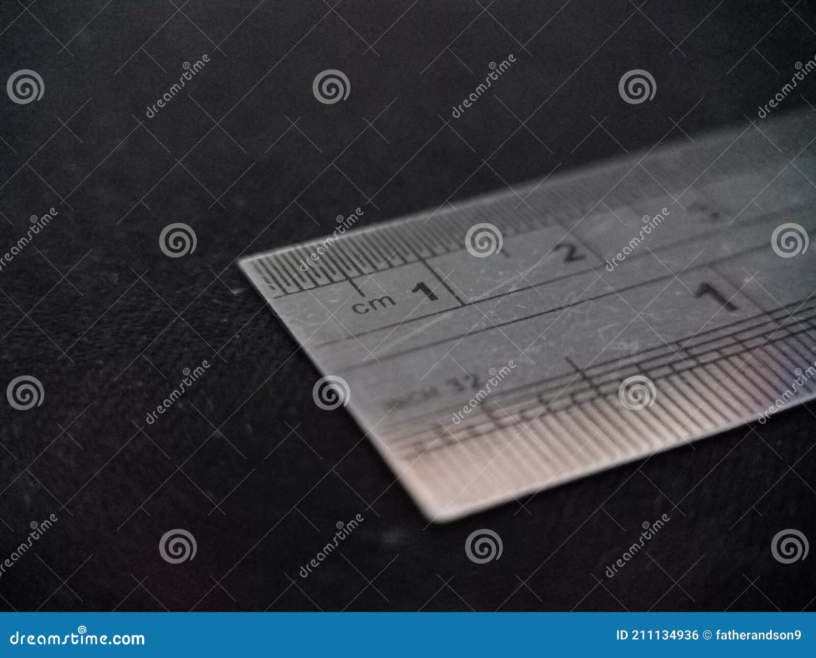 Steel Rules with Black Background Stock Photo - Image of inch, white ...