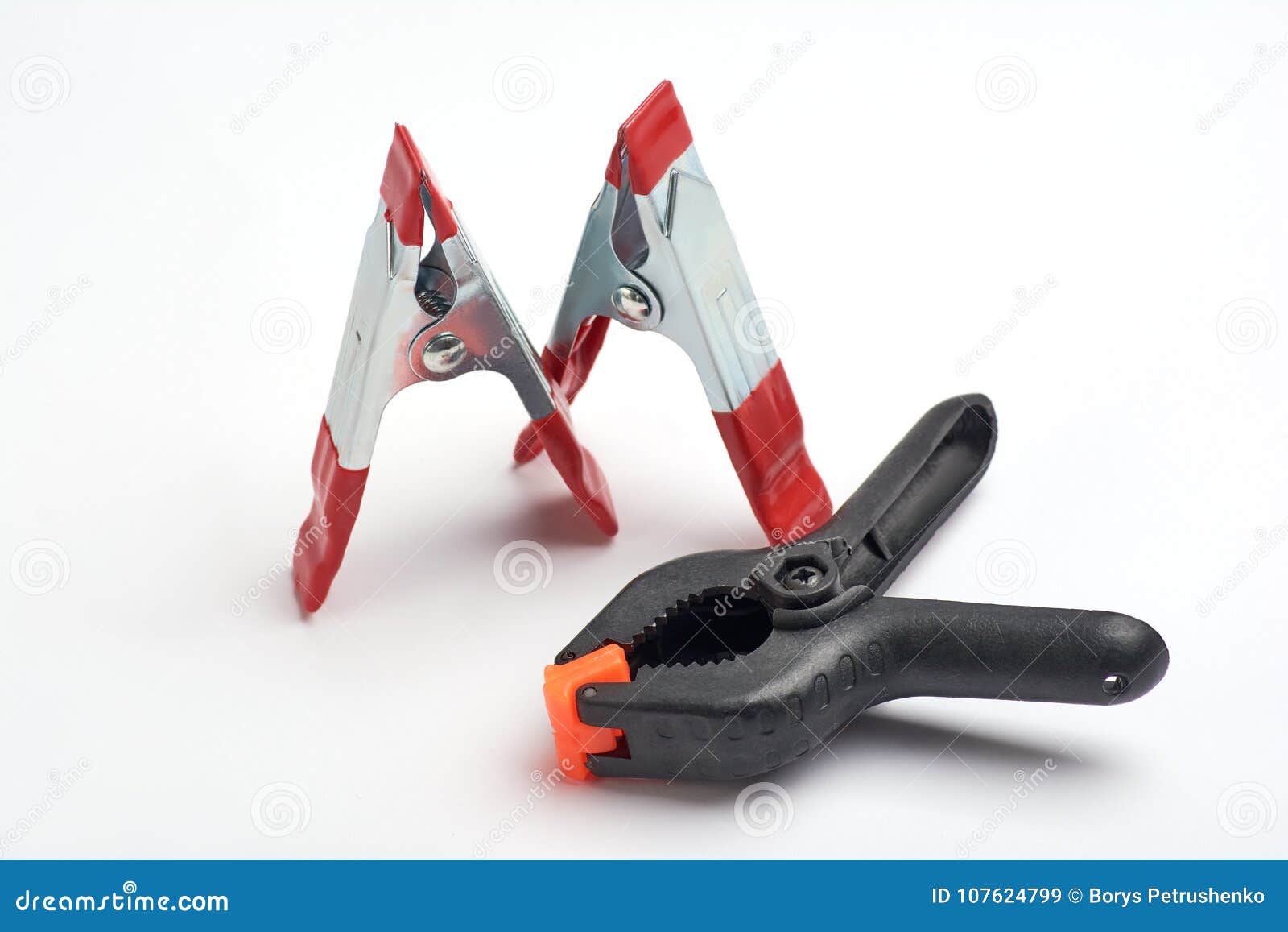 Steel Spring Clamps with Red Rubber Tips on White Background Stock ...
