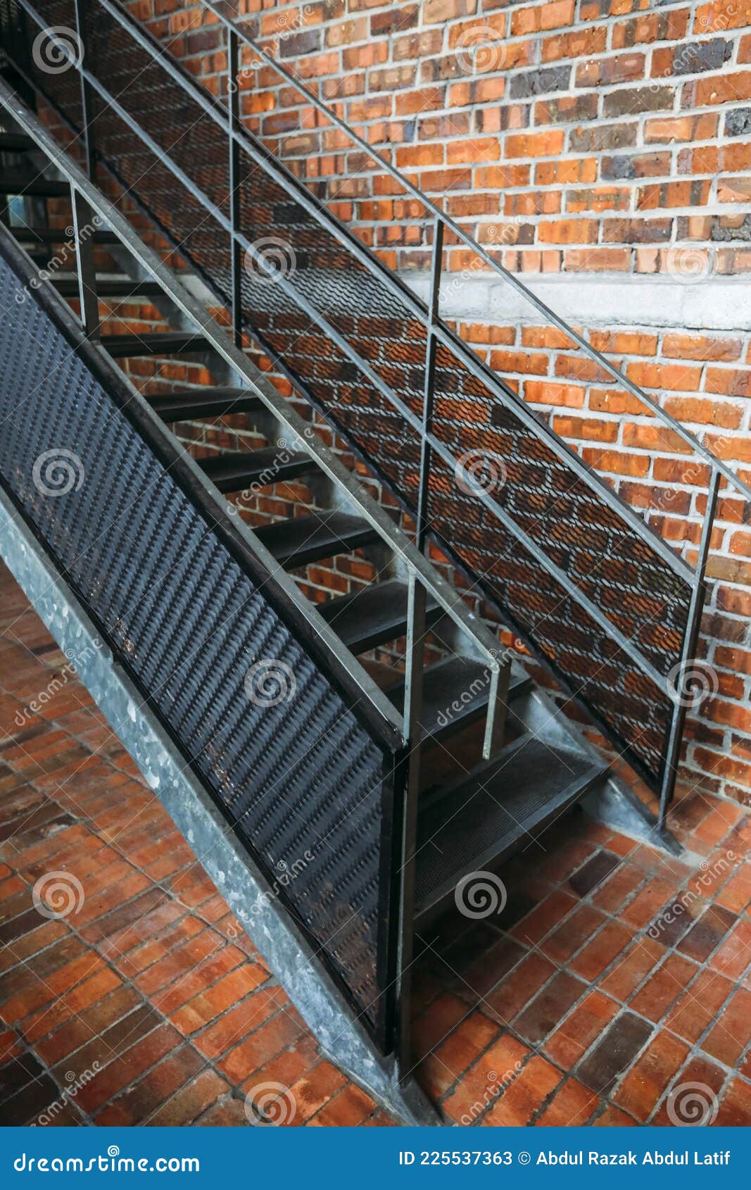 Steel Stairs With A Background Of Old Red Brick Wall Texture Royalty ...