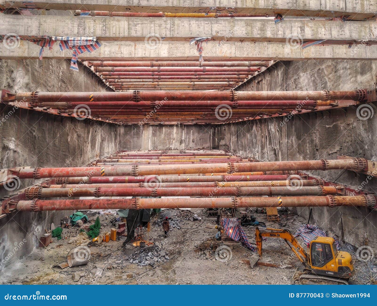 Steel Support Beams On A Street With Construction Workers During The ...