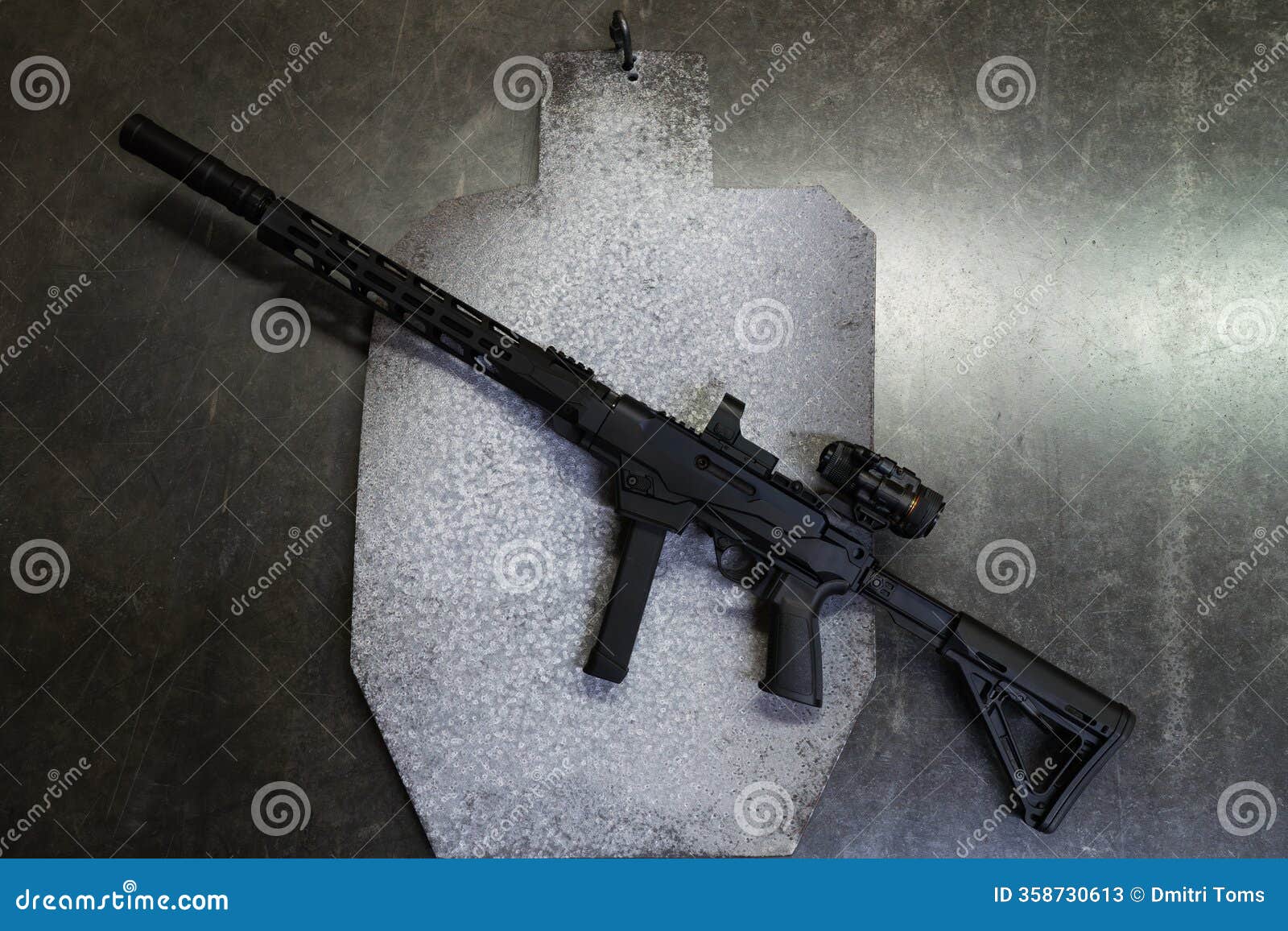 Steel Target and Tactical Rifle with Silencer in Shooting Range Stock ...