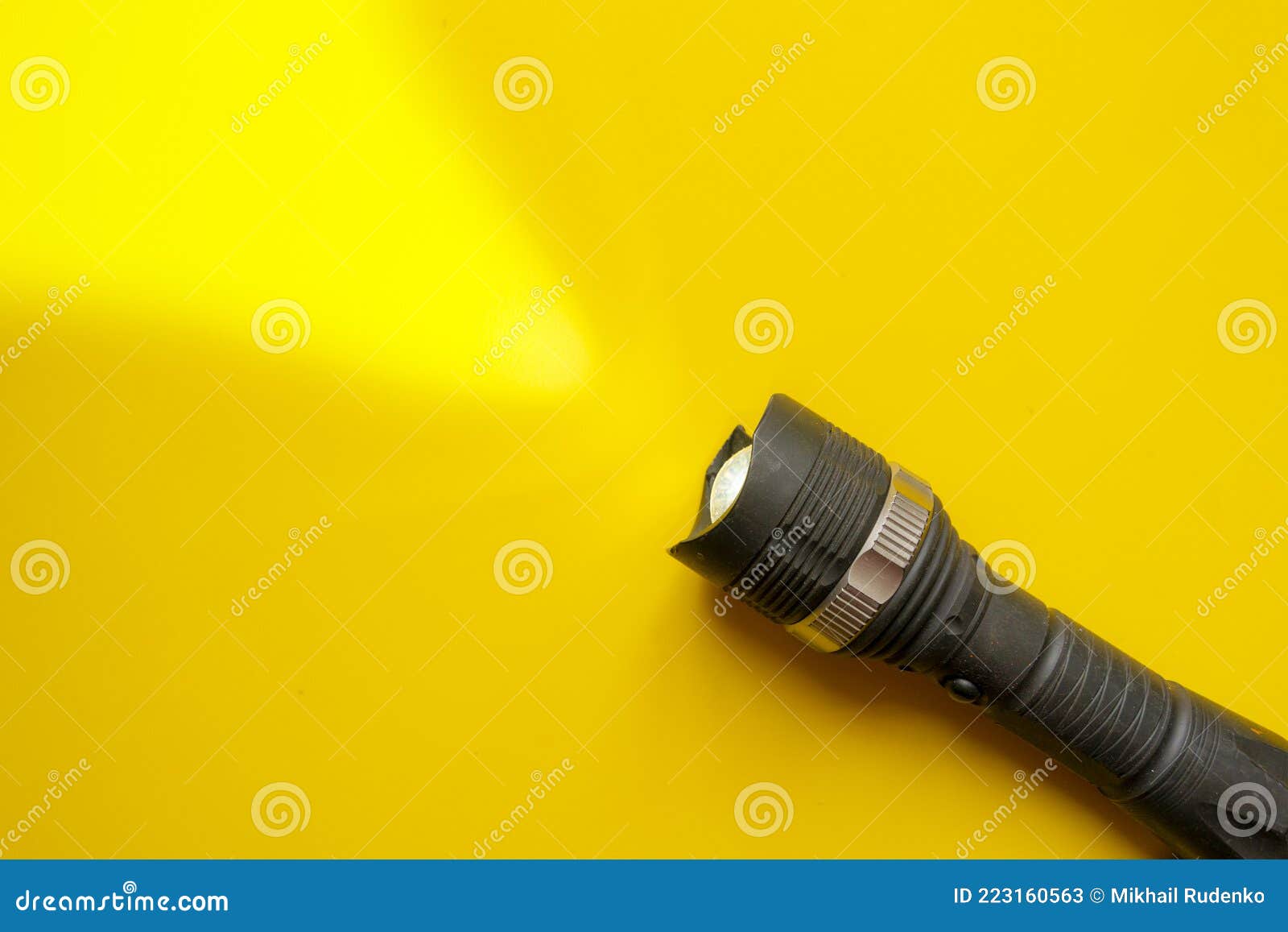 Steel Torch Isolated on Yellow Surface, Producing Light Beams or Rays ...