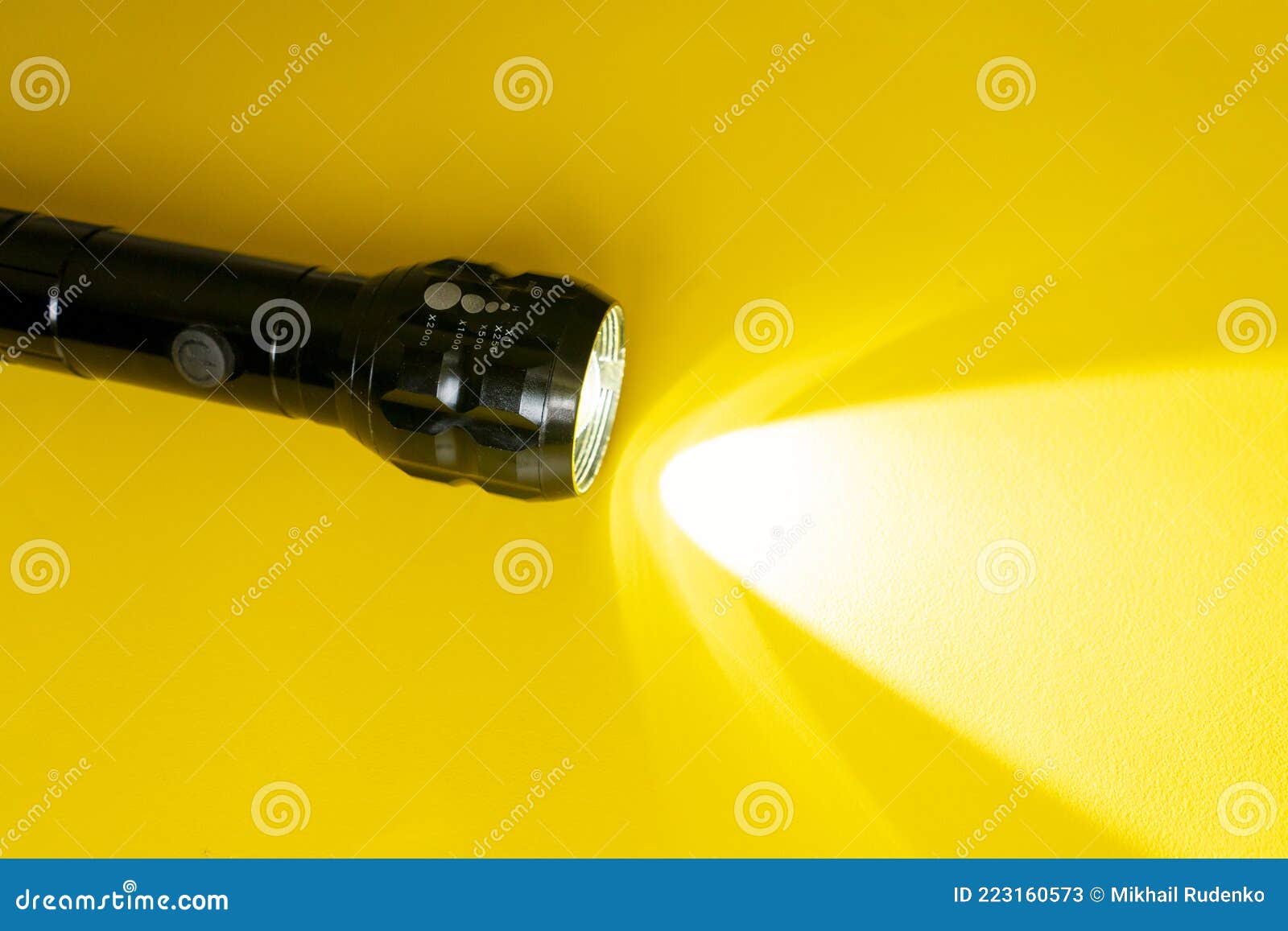 Steel Torch Isolated on Yellow Surface, Producing Light Beams or Rays ...