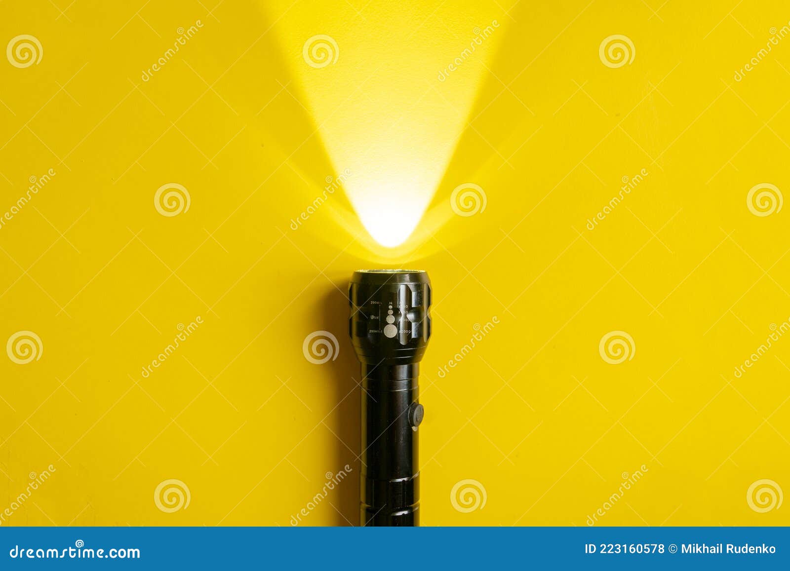 Steel Torch Isolated on Yellow Surface, Producing Light Beams or Rays ...