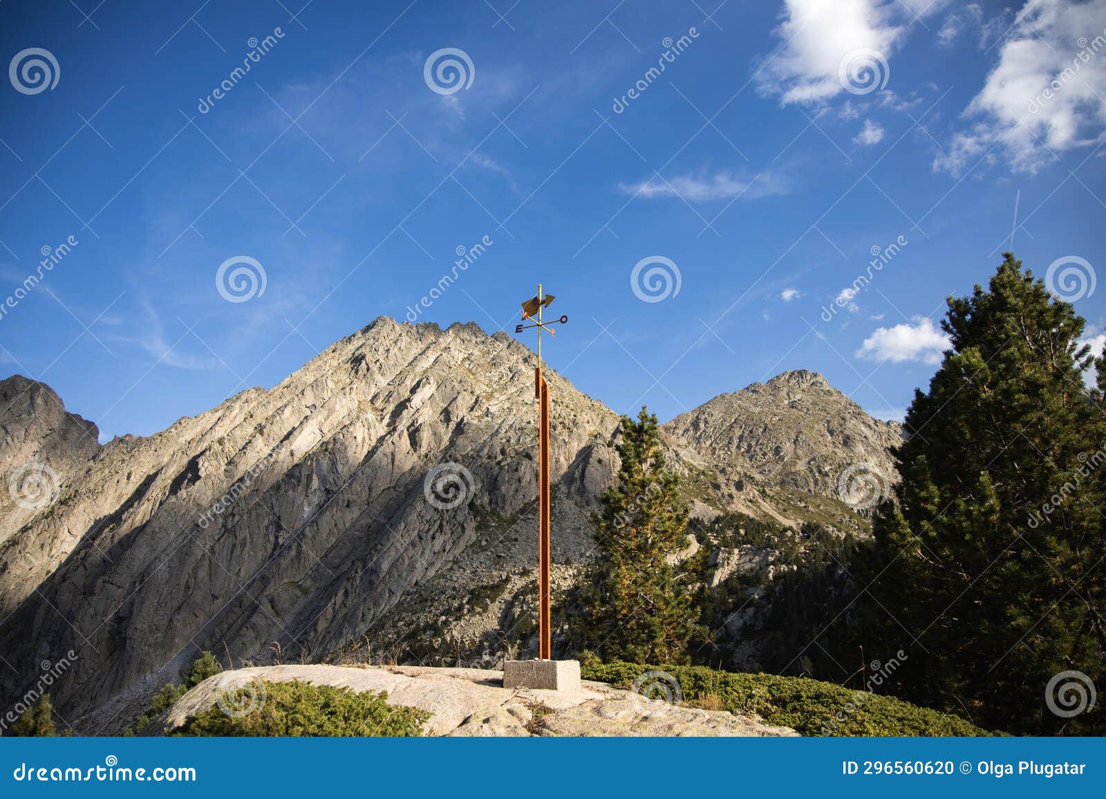 Steel Wind Direction Indicator with Arrow in the Mountains Stock Photo ...