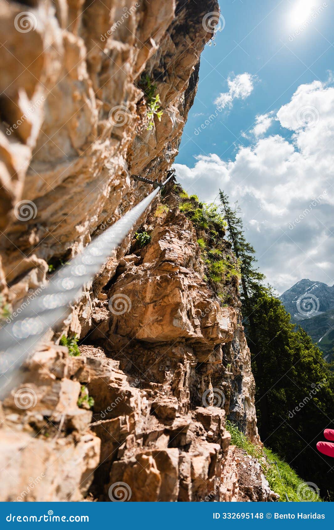 Steel Wire Cable Leading Up a Climbing Path on a Stone Mountain Wall ...
