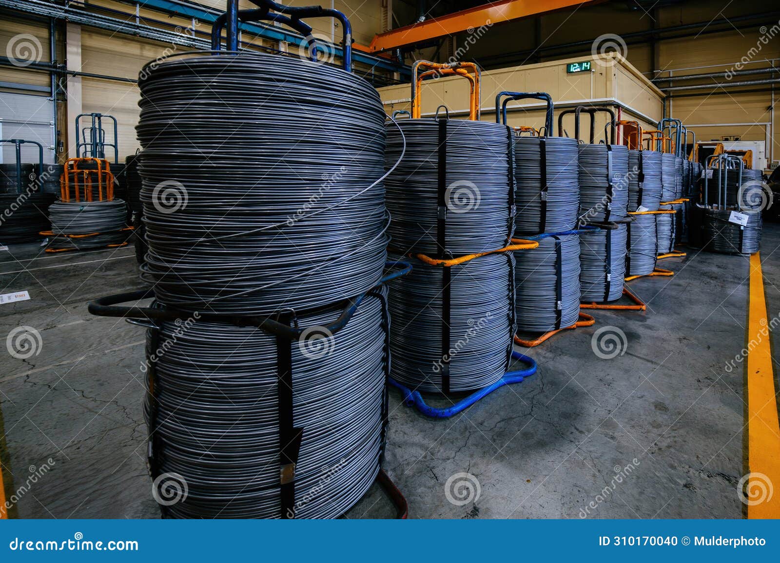 Steel Wire Coil in Metalworking Factory Stock Photo - Image of spiral ...