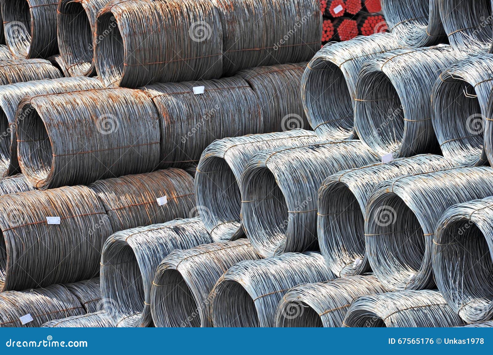 Steel wire roll and pipe stock photo. Image of industry - 67565176