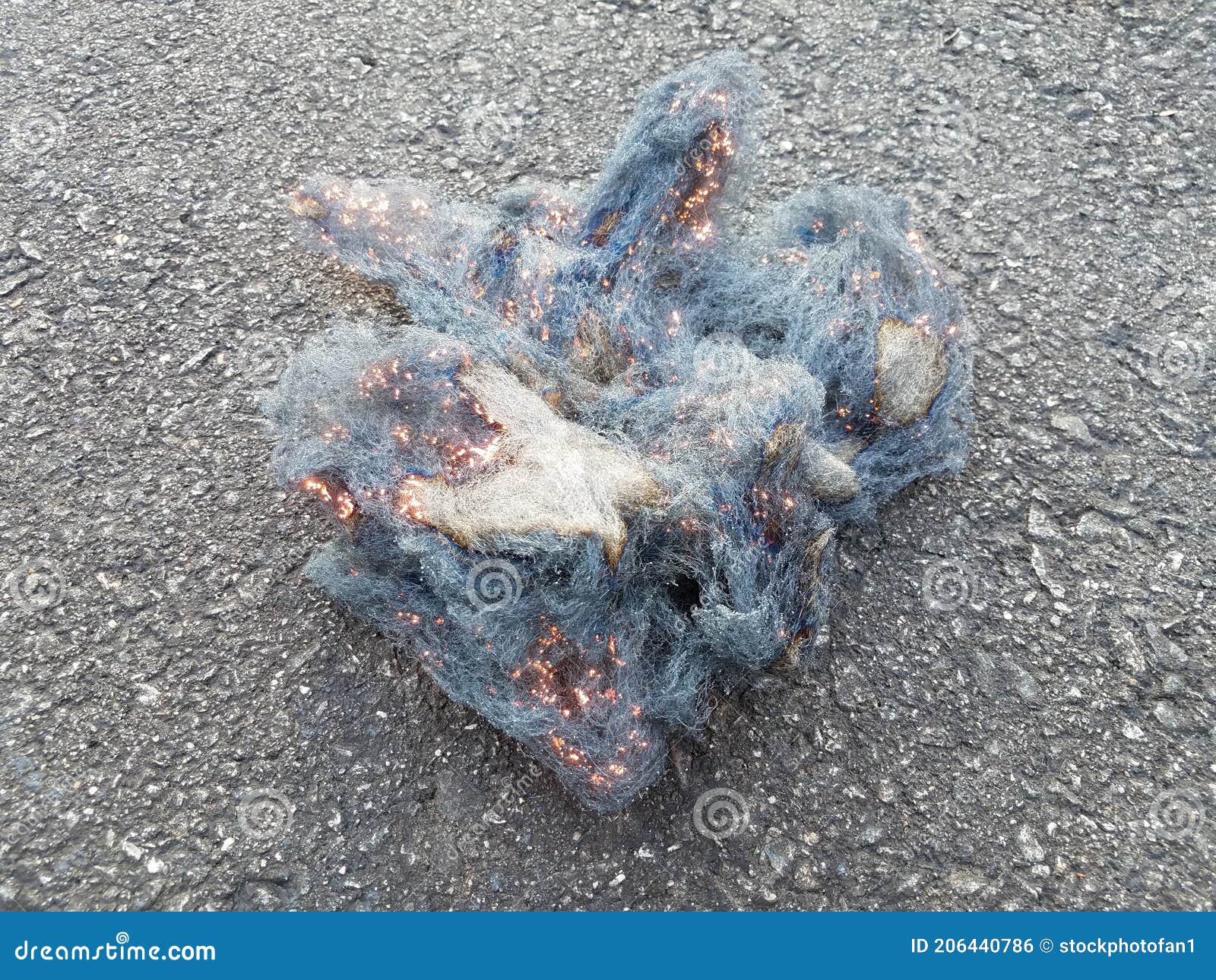 Steel Wool on Fire with Flames on Asphalt Stock Photo - Image of burn ...