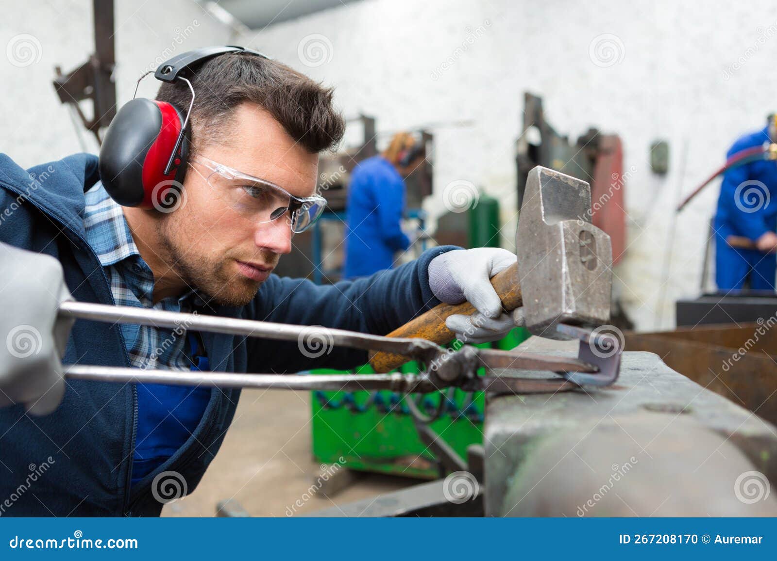 Steel worker doing shape stock photo. Image of order - 267208170