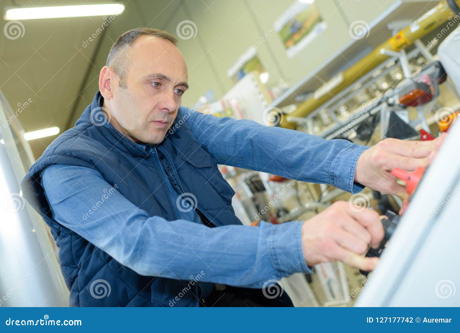Steel Worker Running Per Machine Stock Photo - Image of coveralls ...