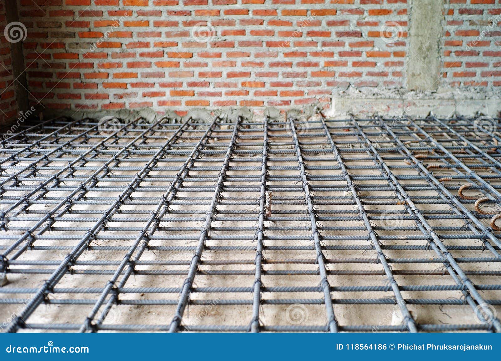 Steelwork for Reinforcement of Concrete Floor with Brickwork Background ...