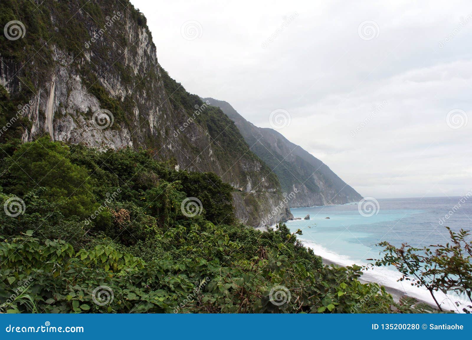 Cliff and clear sea water stock photo. Image of temple - 135200280