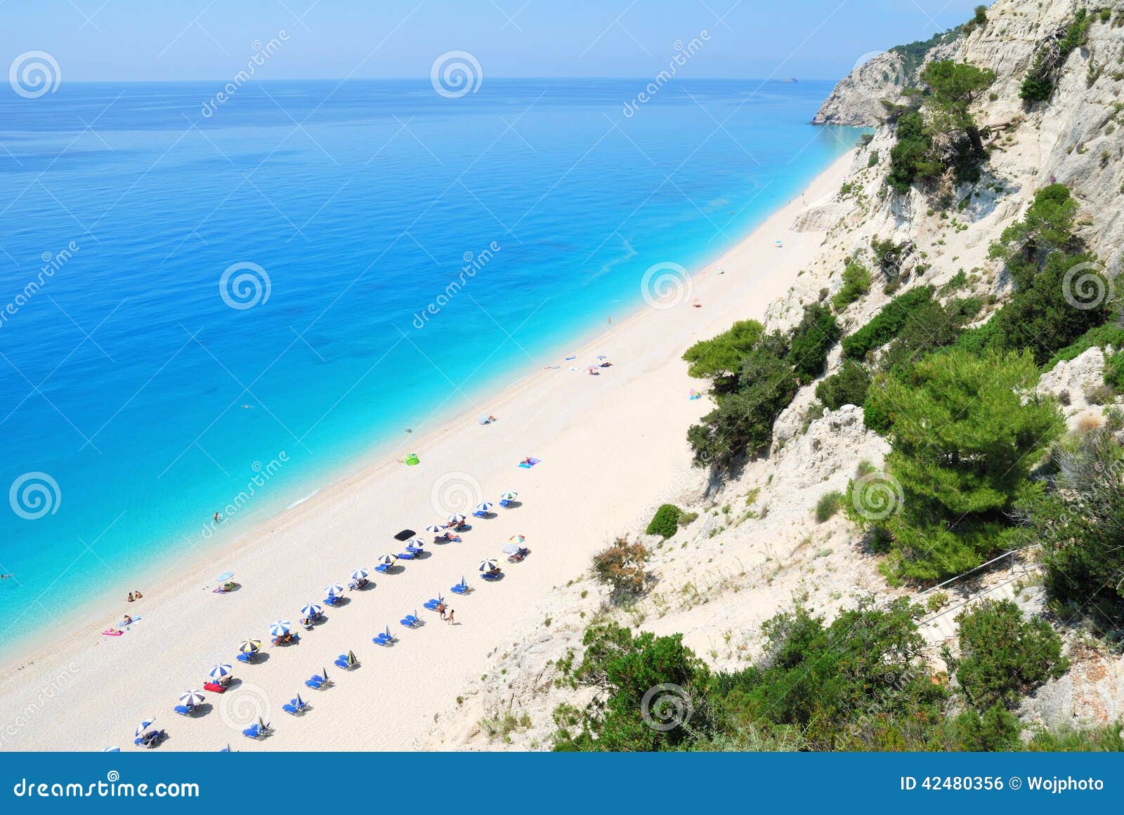 Steep Cliffs and a Long Beach with Turquoise Sea Stock Photo - Image of ...