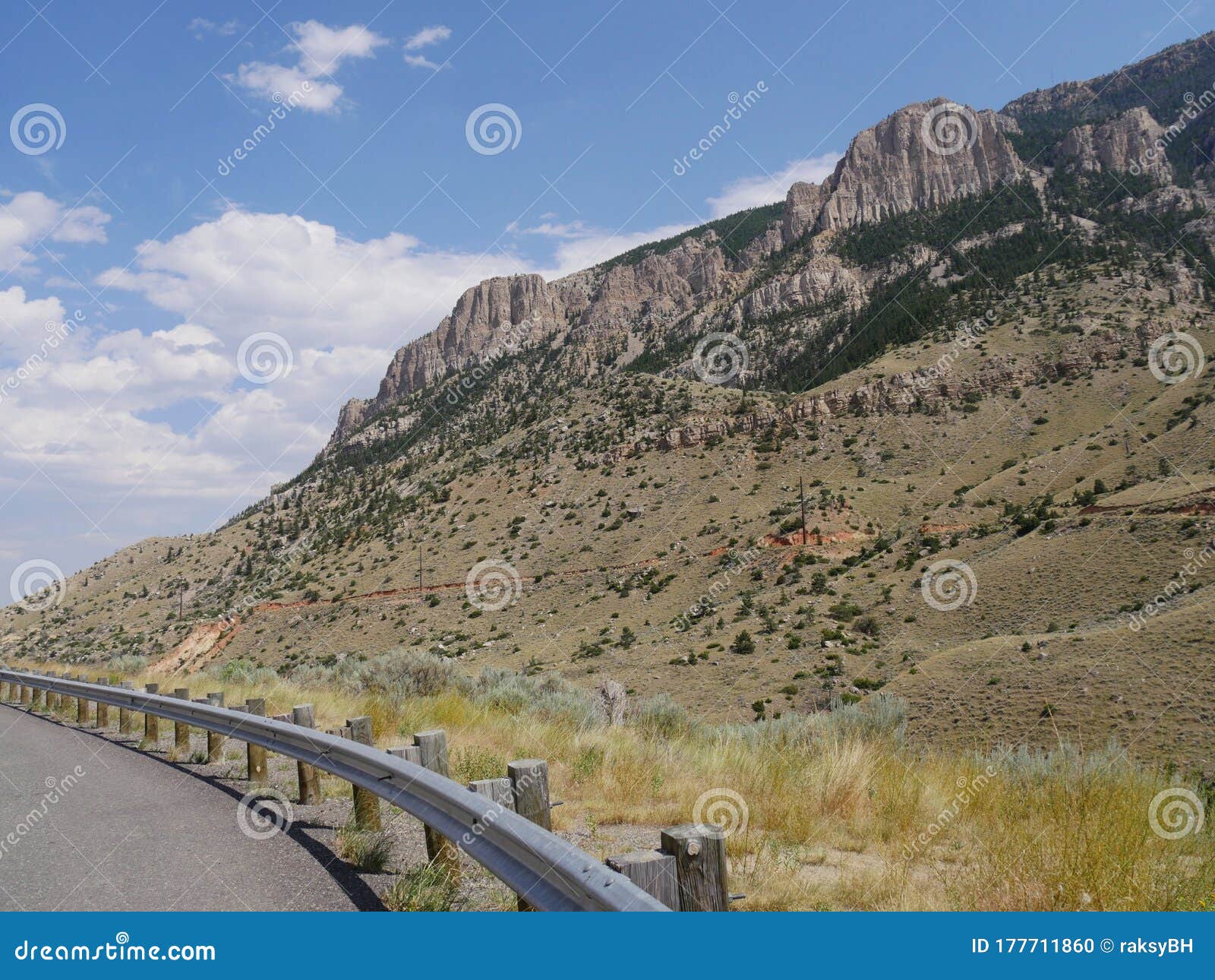 Mountain Passes with a Paved Road and Railing in Wyoming Stock Photo ...