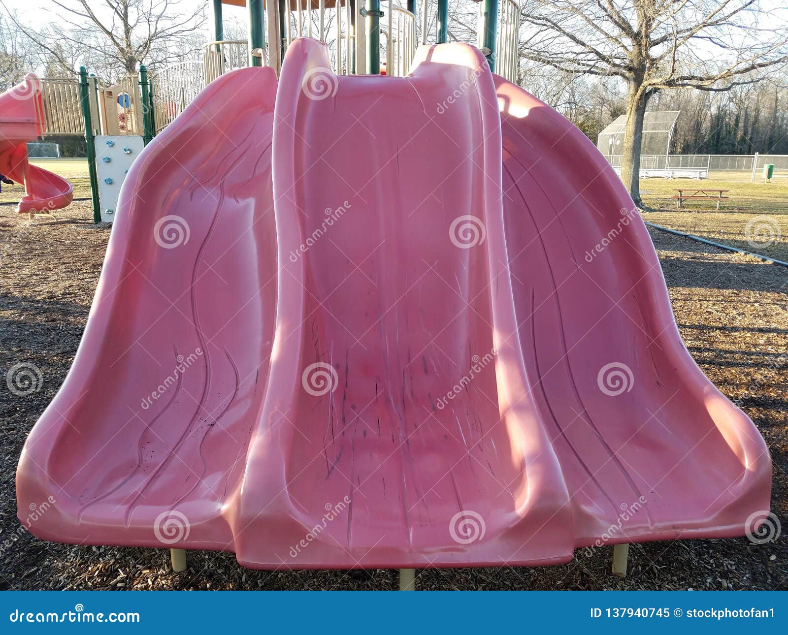 Steep Red or Pink Plastic Slide at Park Playground Stock Image - Image ...