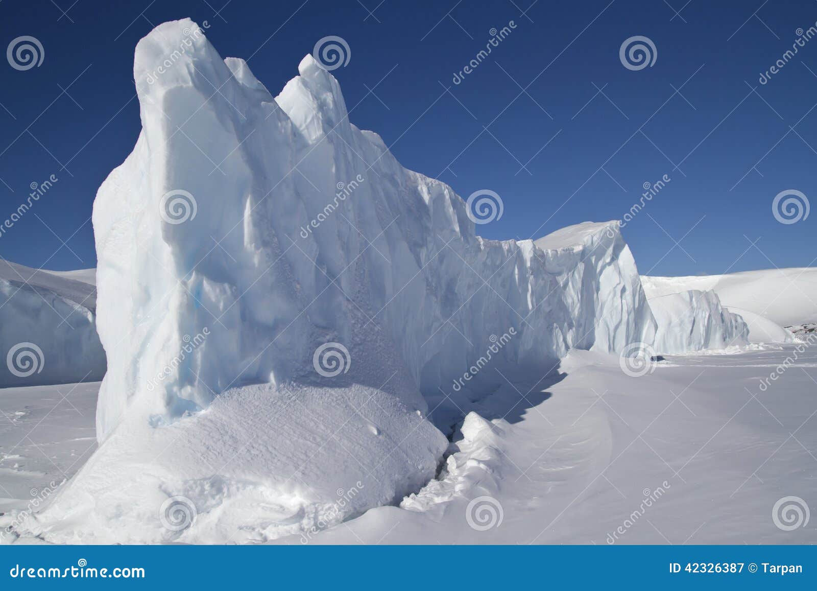 Steep Side of a Large Iceberg that is Frozen in Antarctic Stock Image ...