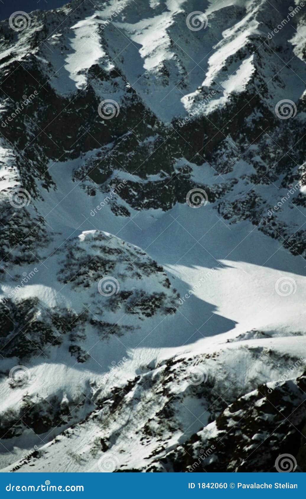 Steep, Snow-covered Mountainside Stock Photo - Image of climbs, hike ...