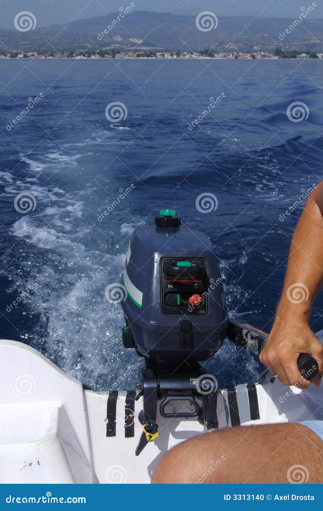 Steering a boat at sea stock photo. Image of nautical - 3313140