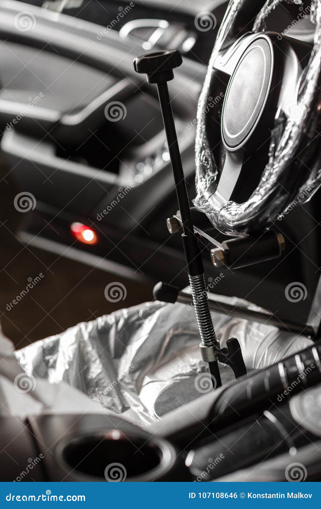 Steering Wheel Lock. Auto Mechanic Sets the Car for Diagnostics and ... Steering Wheel Lock. Auto Mechanic Sets the Car for Diagnostics and ...
