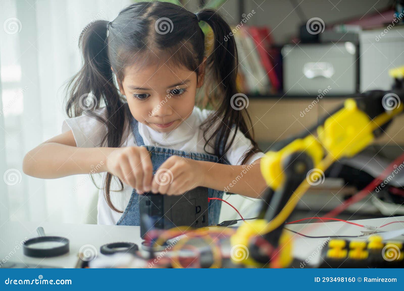 STEM Education Concept. Asian Young Girl Learning Robot Design Stock ...