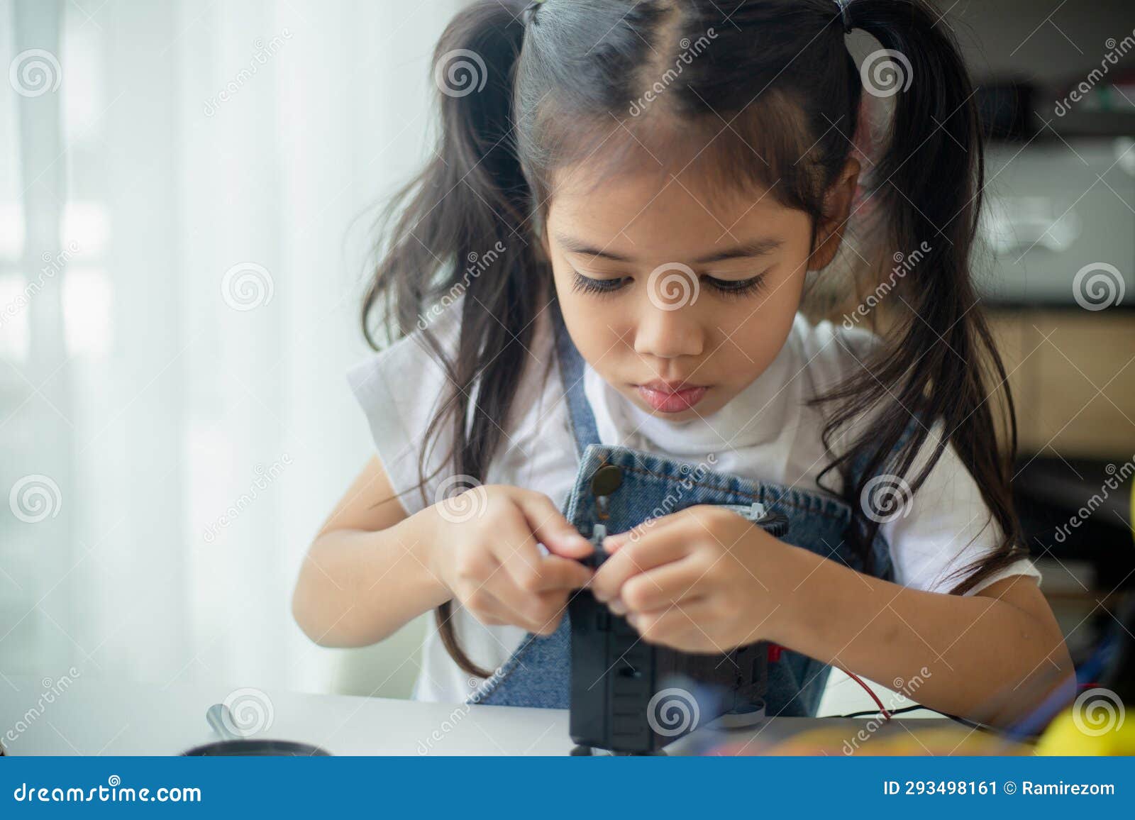 STEM Education Concept. Asian Young Girl Learning Robot Design Stock ...