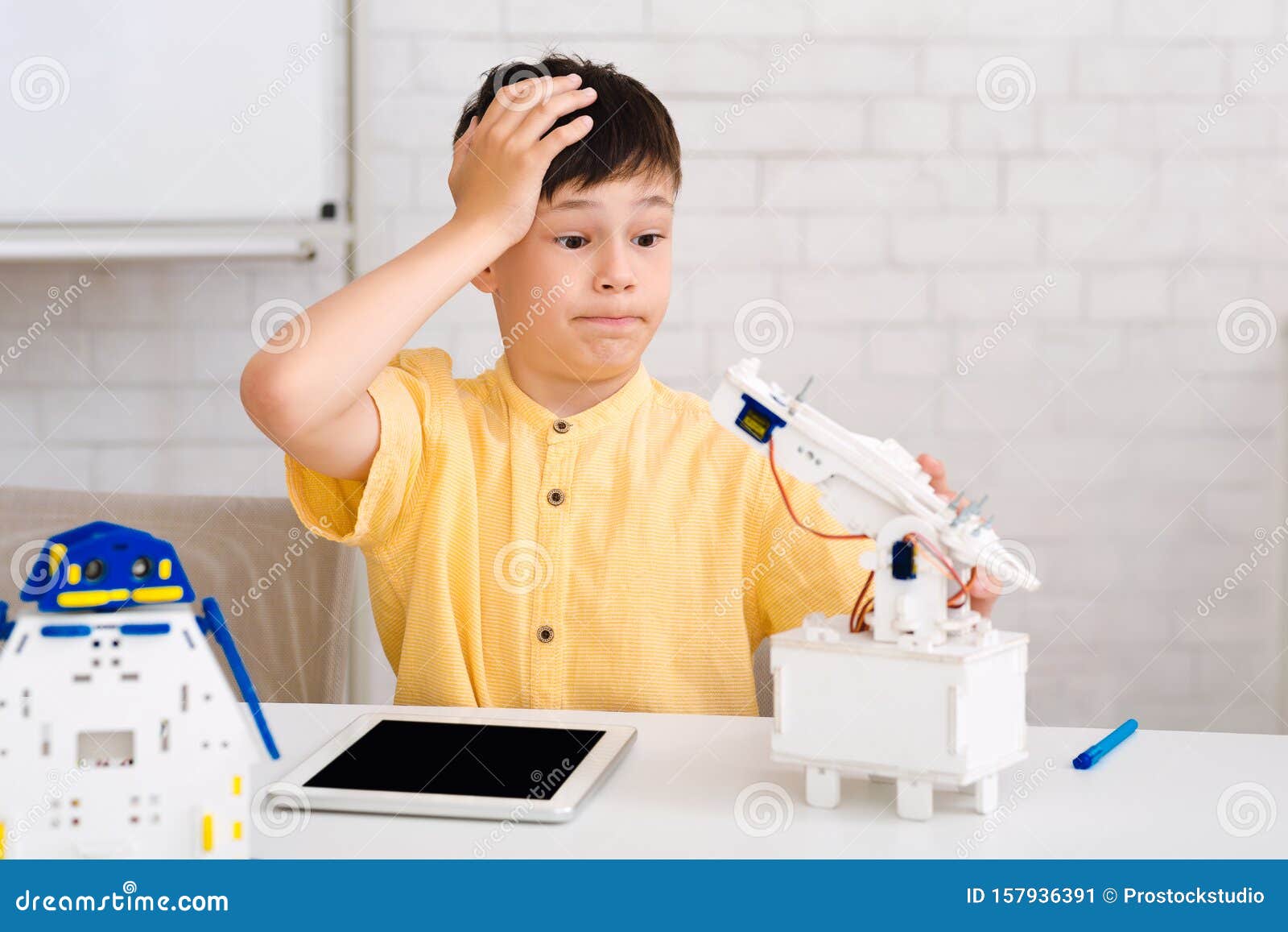 Stem Education. Dismayed Boy Creating Robot and Made Mistake Stock ...