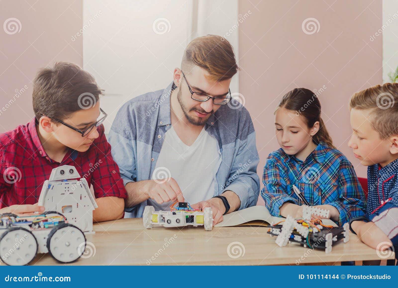 Stem Education. Kids Creating Robots with Teacher Stock Photo - Image ... Stem Education. Kids Creating Robots with Teacher Stock Photo - Image ...