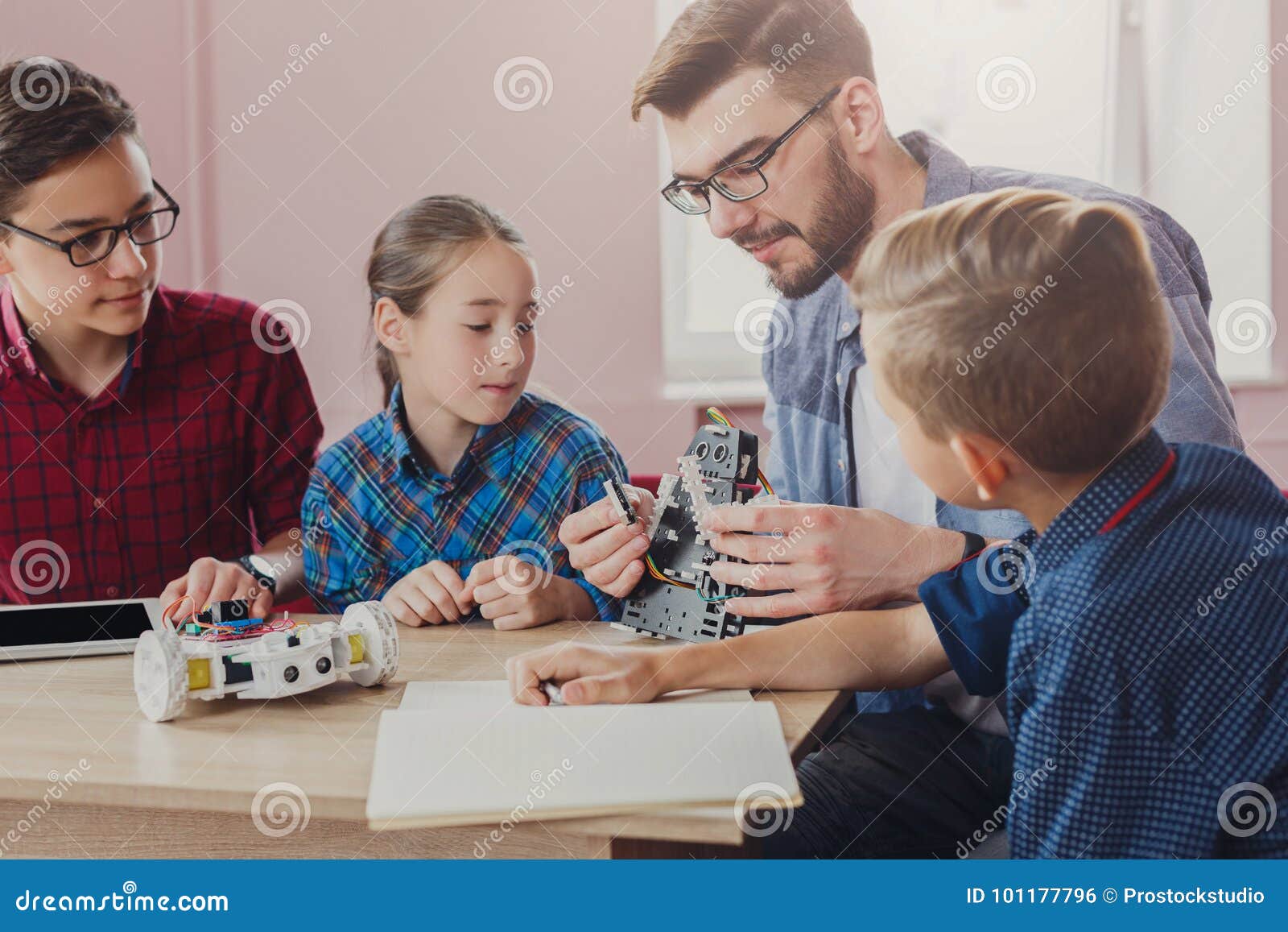 Stem Education. Kids Creating Robots with Teacher Stock Photo - Image ... Stem Education. Kids Creating Robots with Teacher Stock Photo - Image ...