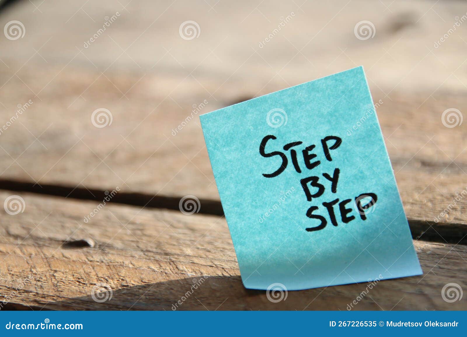 Step by Step. Motivational Quotes. the Inscription on the Blue Tag ...