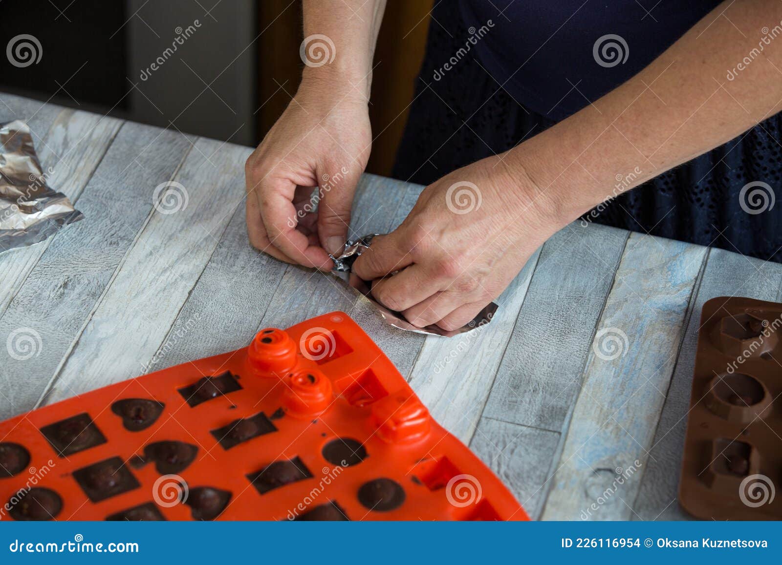 Step-by-step Process of Making Chocolates from Dark Chocolate and ...