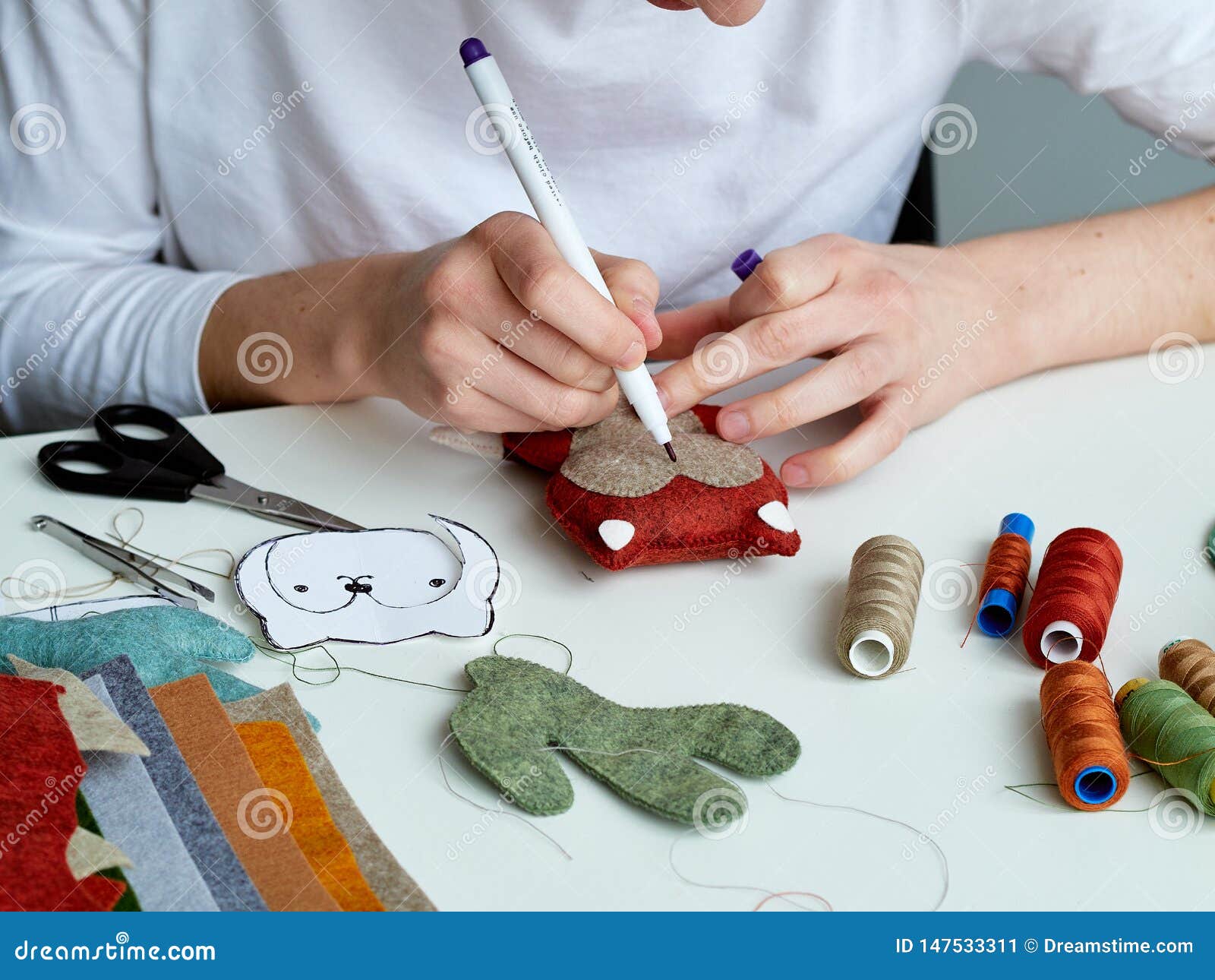 The Process of Manufacturing Toys Made of Felt, a Master of Toys. Stock ...