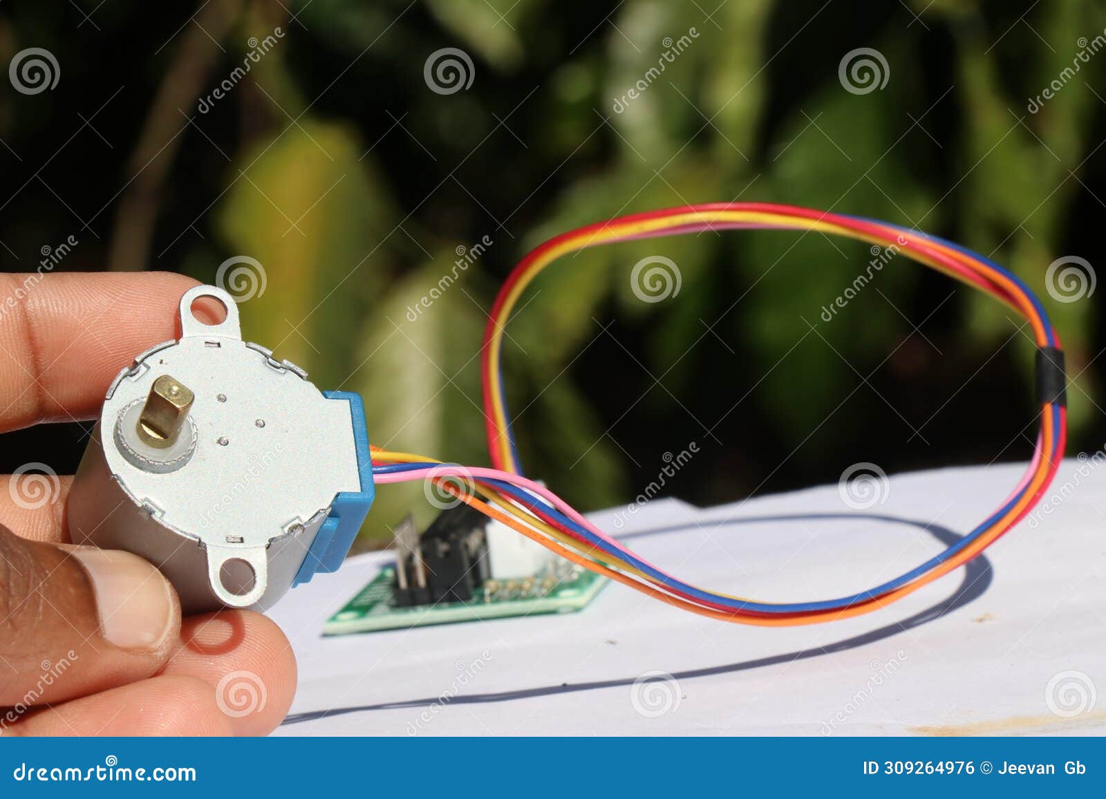 Stepper Motor Held in the Hand that is Used in Many Prototyping ...