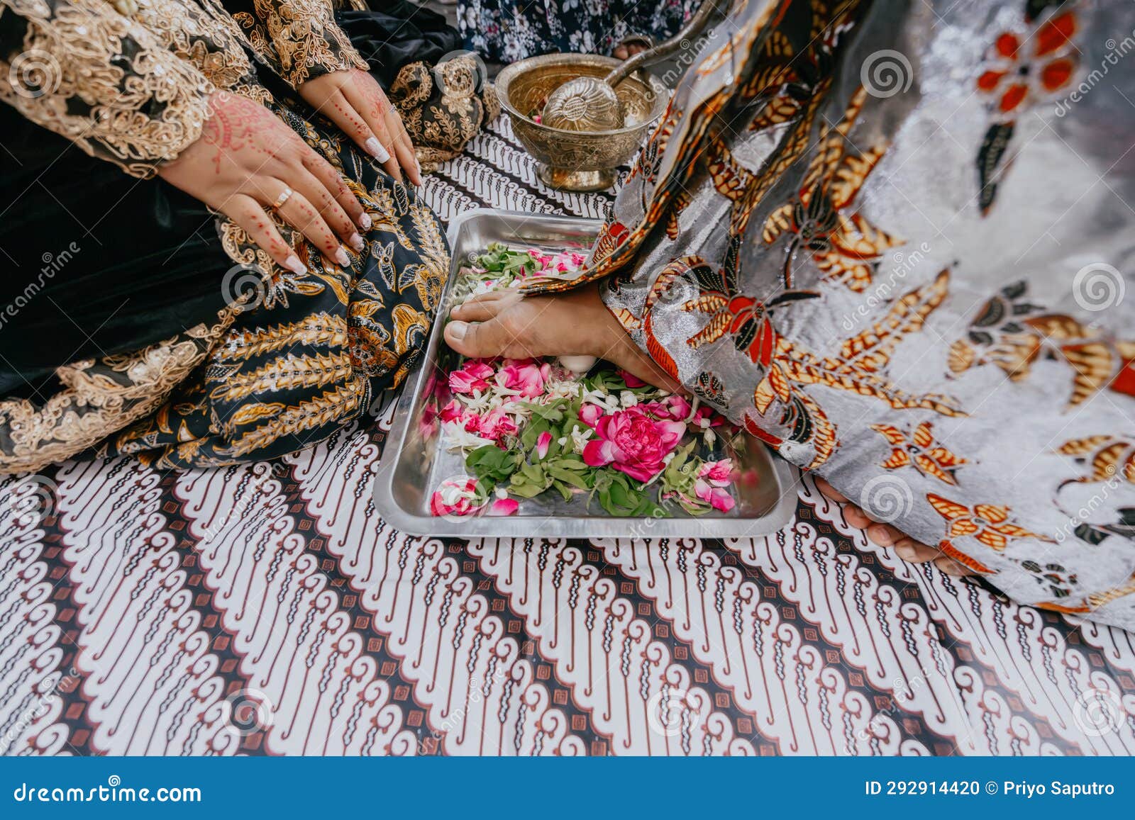 Stepping on the Egg Ceremony at a Javanese Wedding. Stock Photo - Image ...