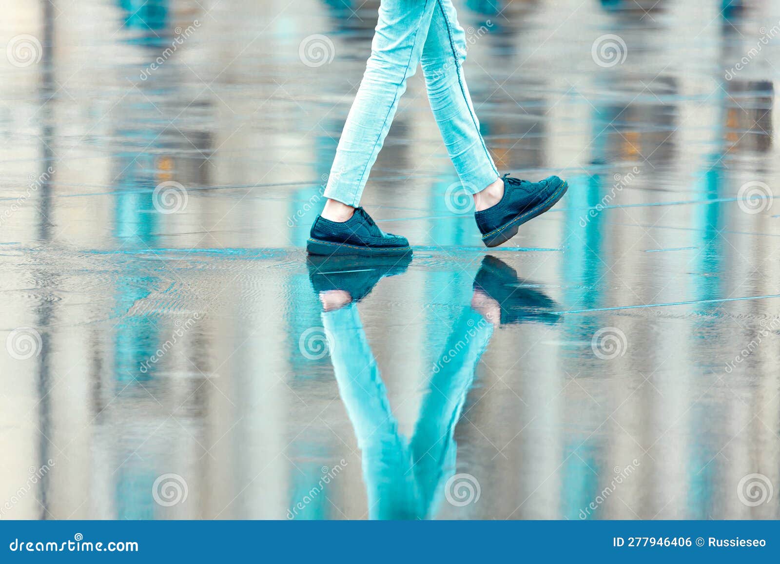 Stepping Reflection on the Wet Pavement Stock Photo - Image of ...