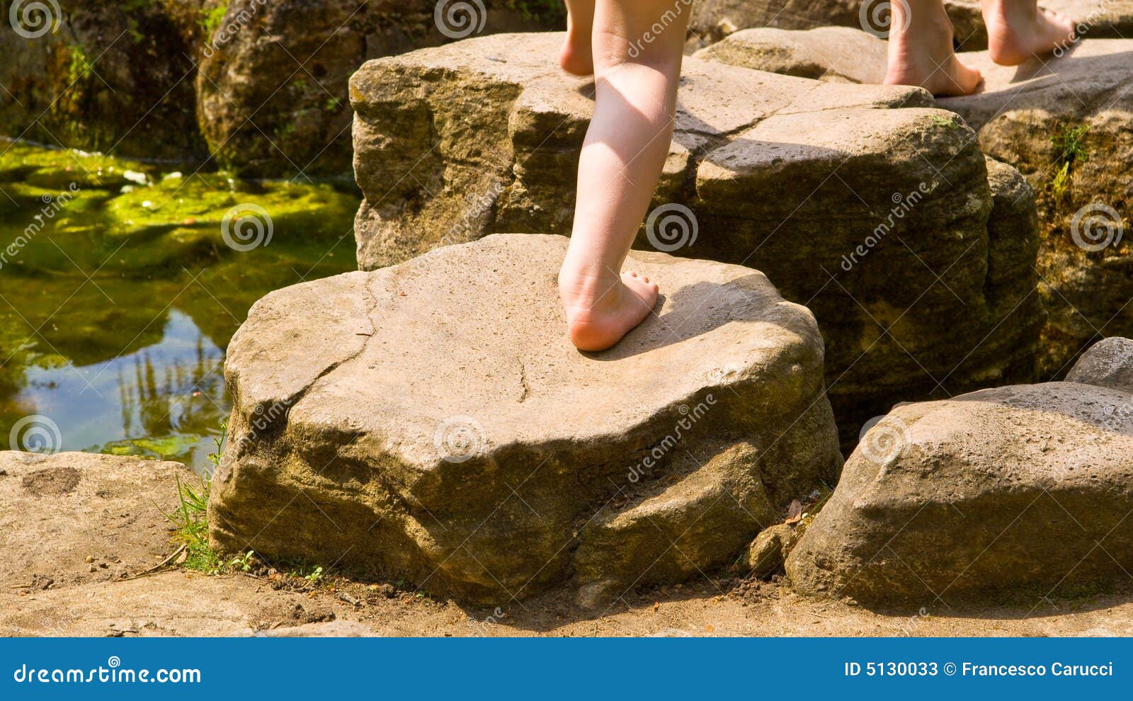 Stepping up a rock stock image. Image of activity, road - 5130033