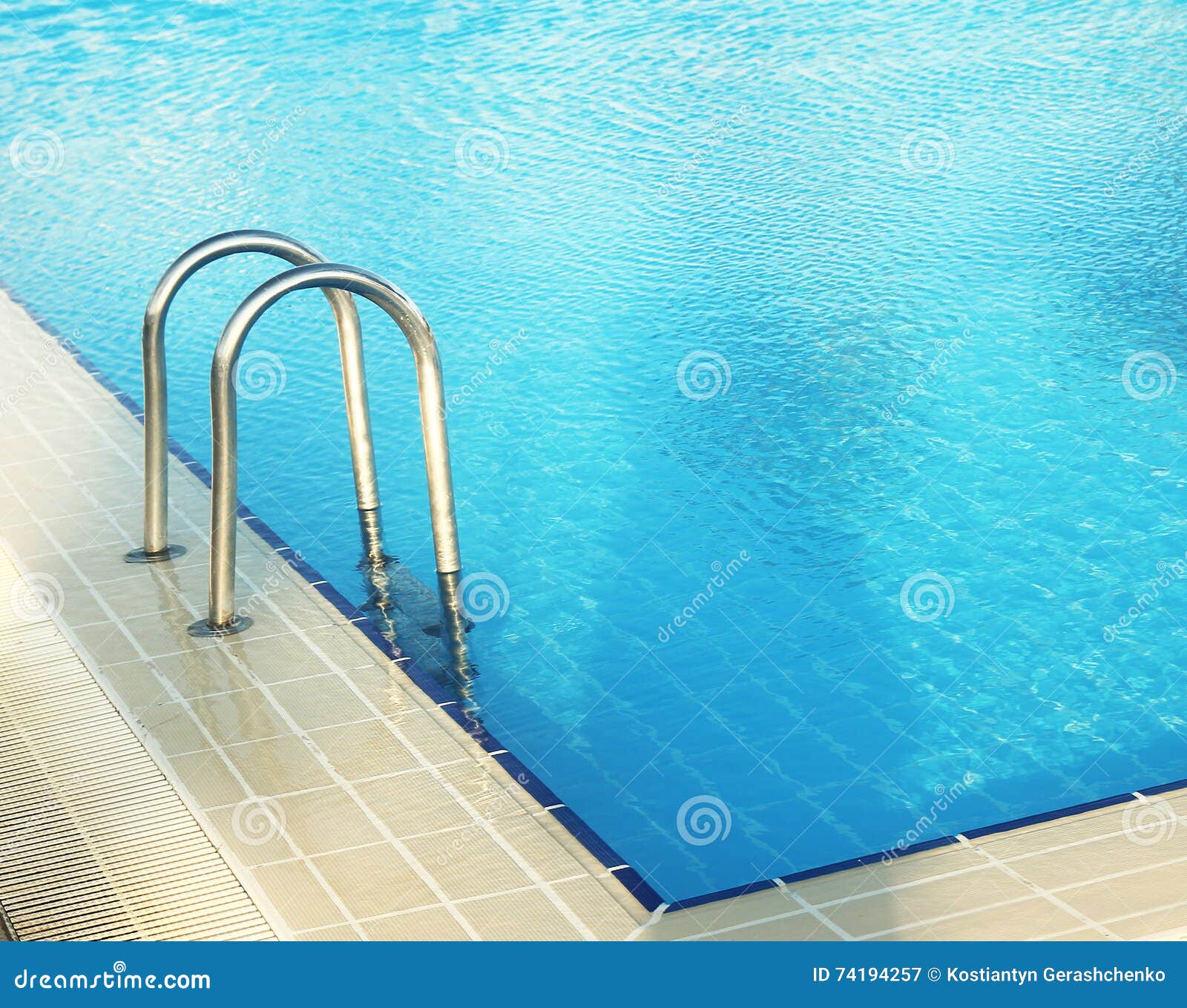 Steps in blue water pool stock image. Image of entrance - 74194257