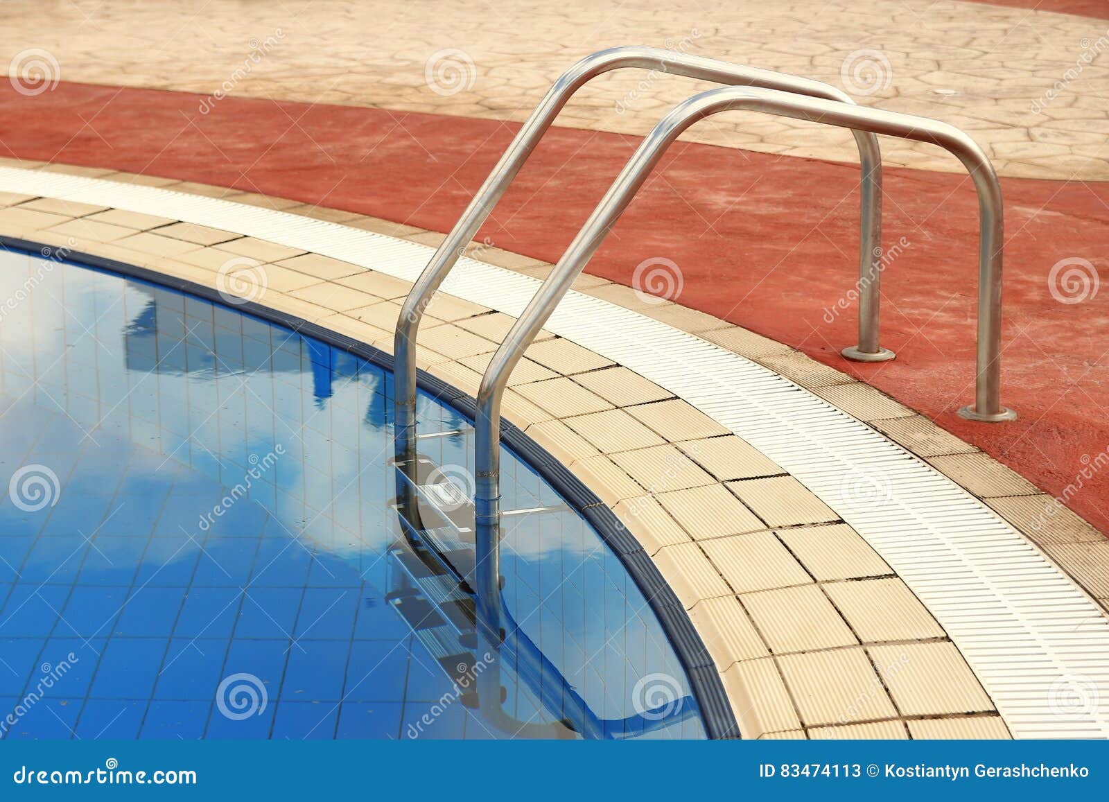 Steps in blue water pool stock image. Image of chrome - 83474113