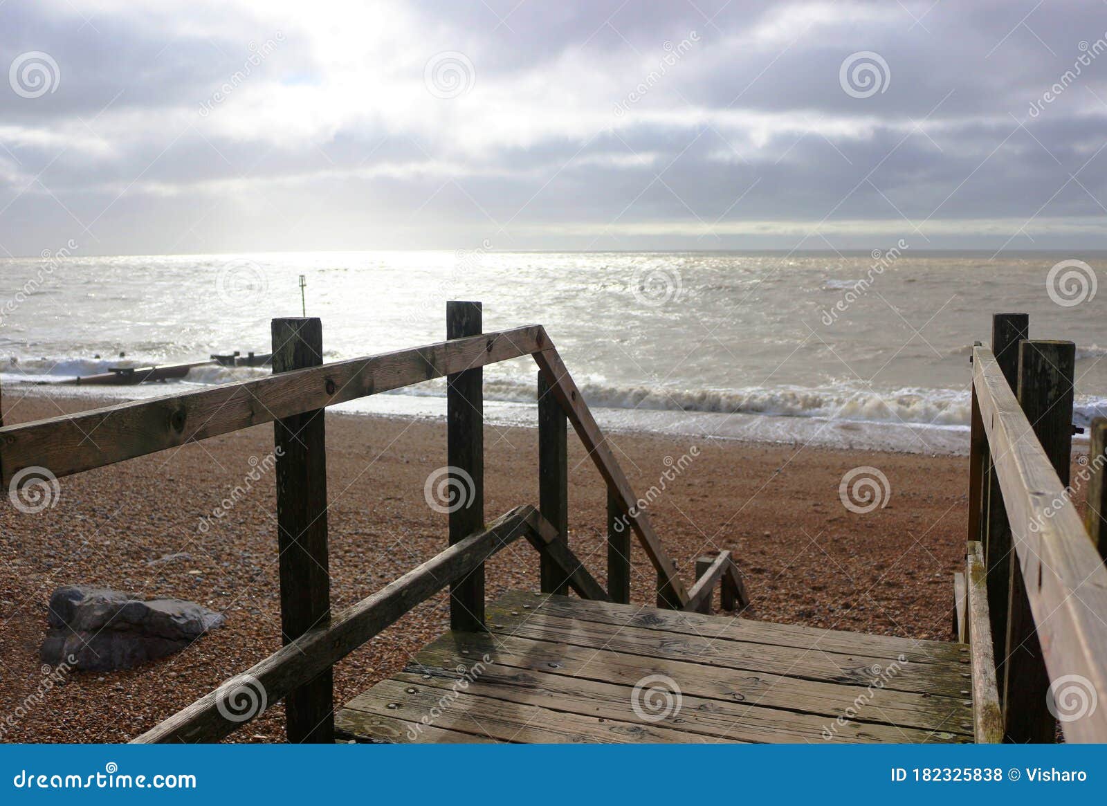 Steps leading to the beach stock photo. Image of ocean - 182325838