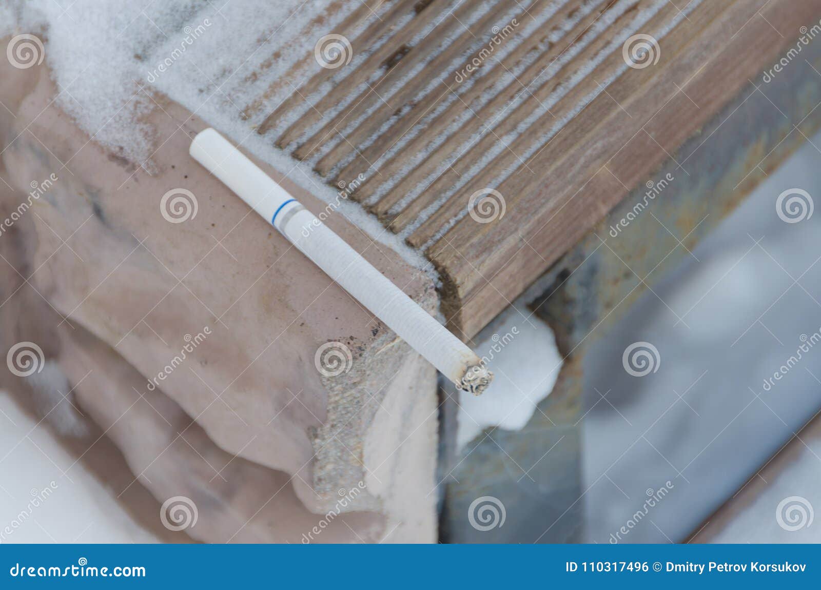 On the Steps Lies Set on Fire Cigarette Stock Photo - Image of closeup ...